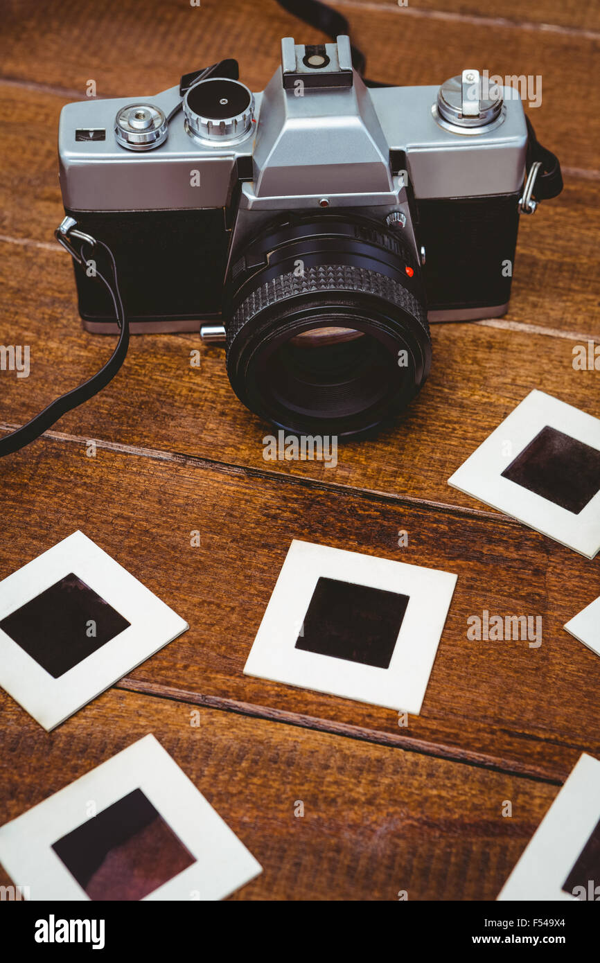 View of an old camera with photos slides Stock Photo - Alamy