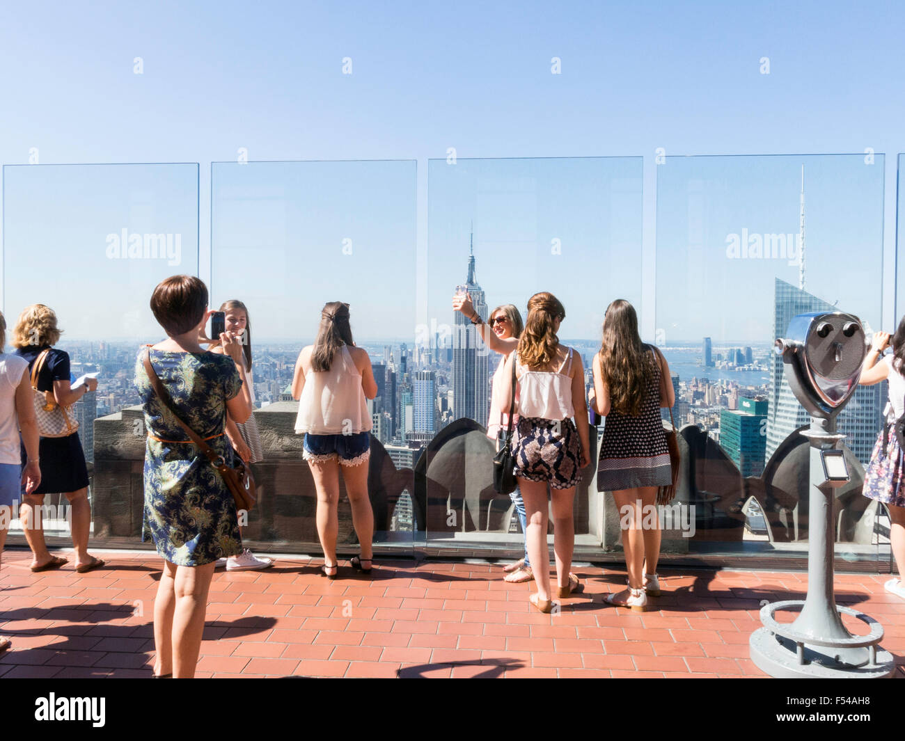 Tourists at Top of the Rock Observation Deck, Rockefeller Center, NYC ...