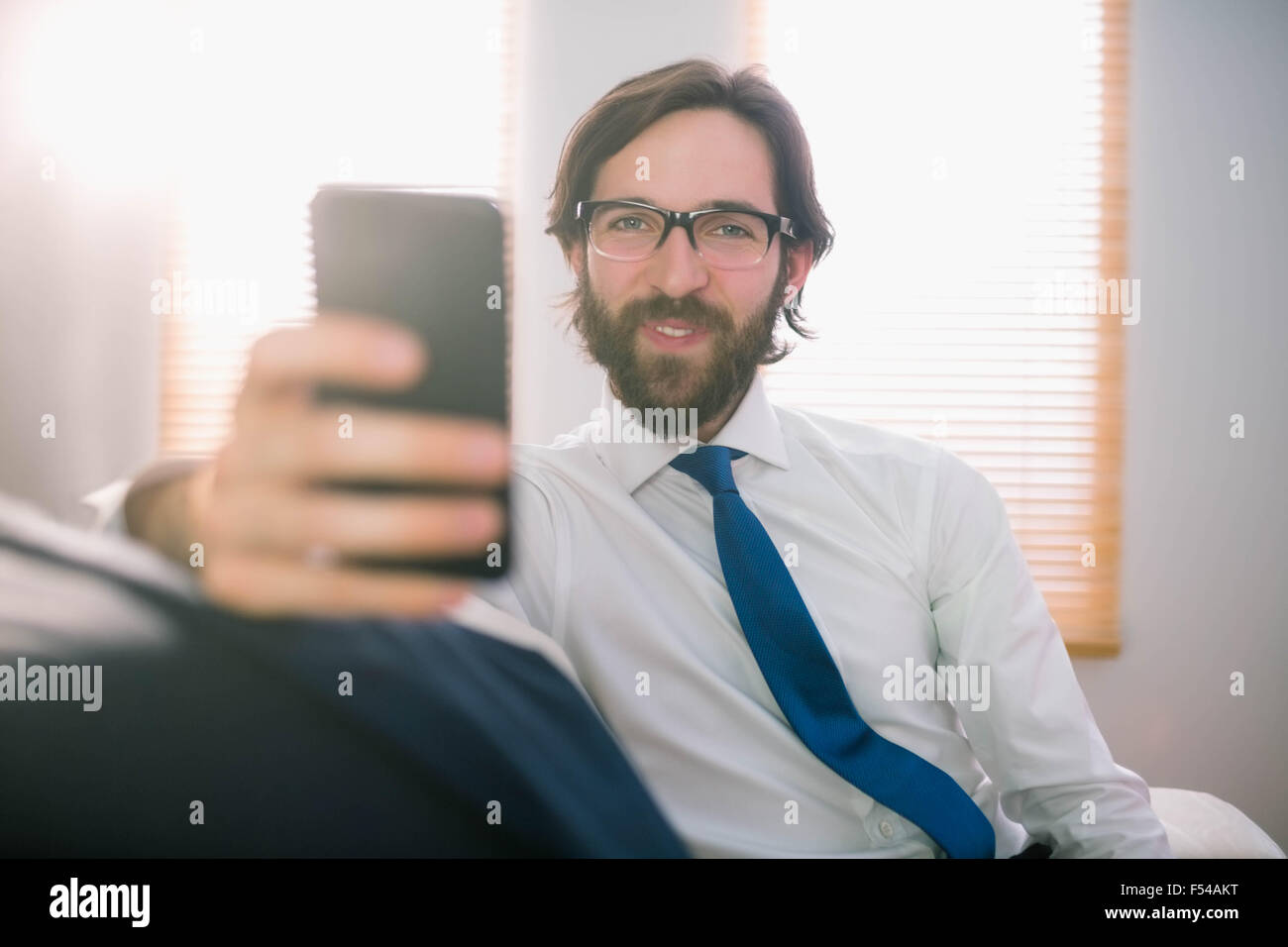 Young businessman showing text hi-res stock photography and images - Alamy