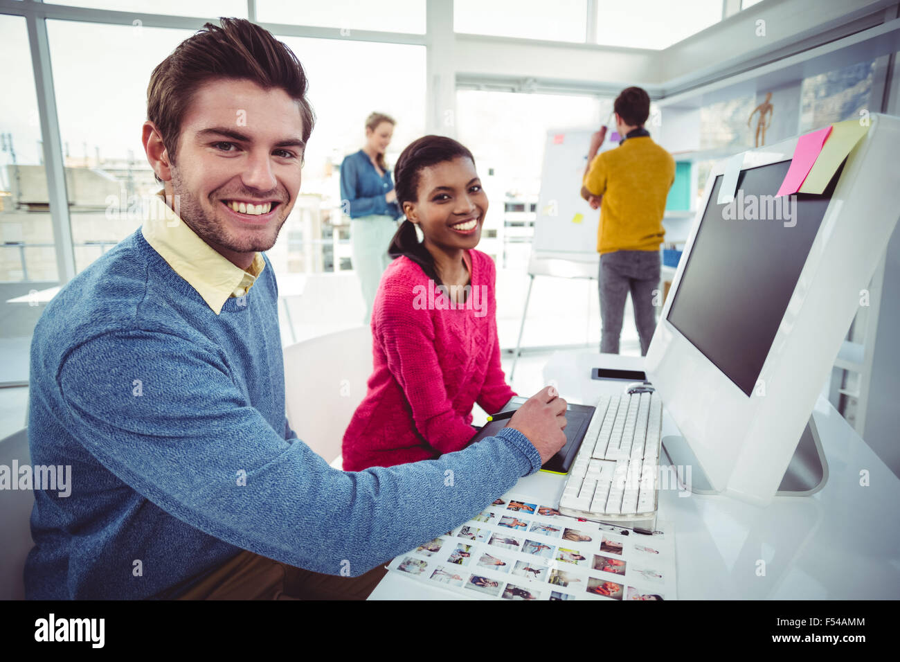 Creative business team working together Stock Photo - Alamy