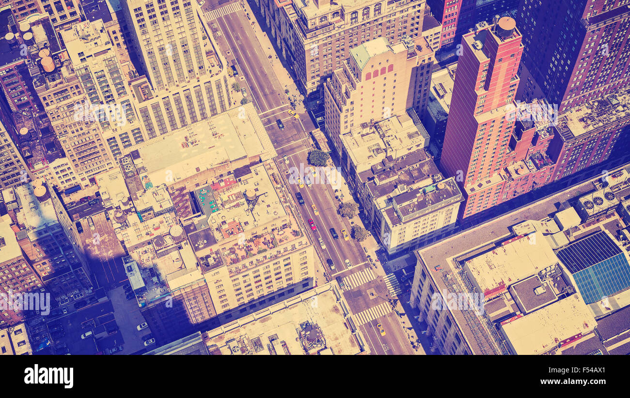 Vintage style aerial picture of Manhattan street with shadow of the ...