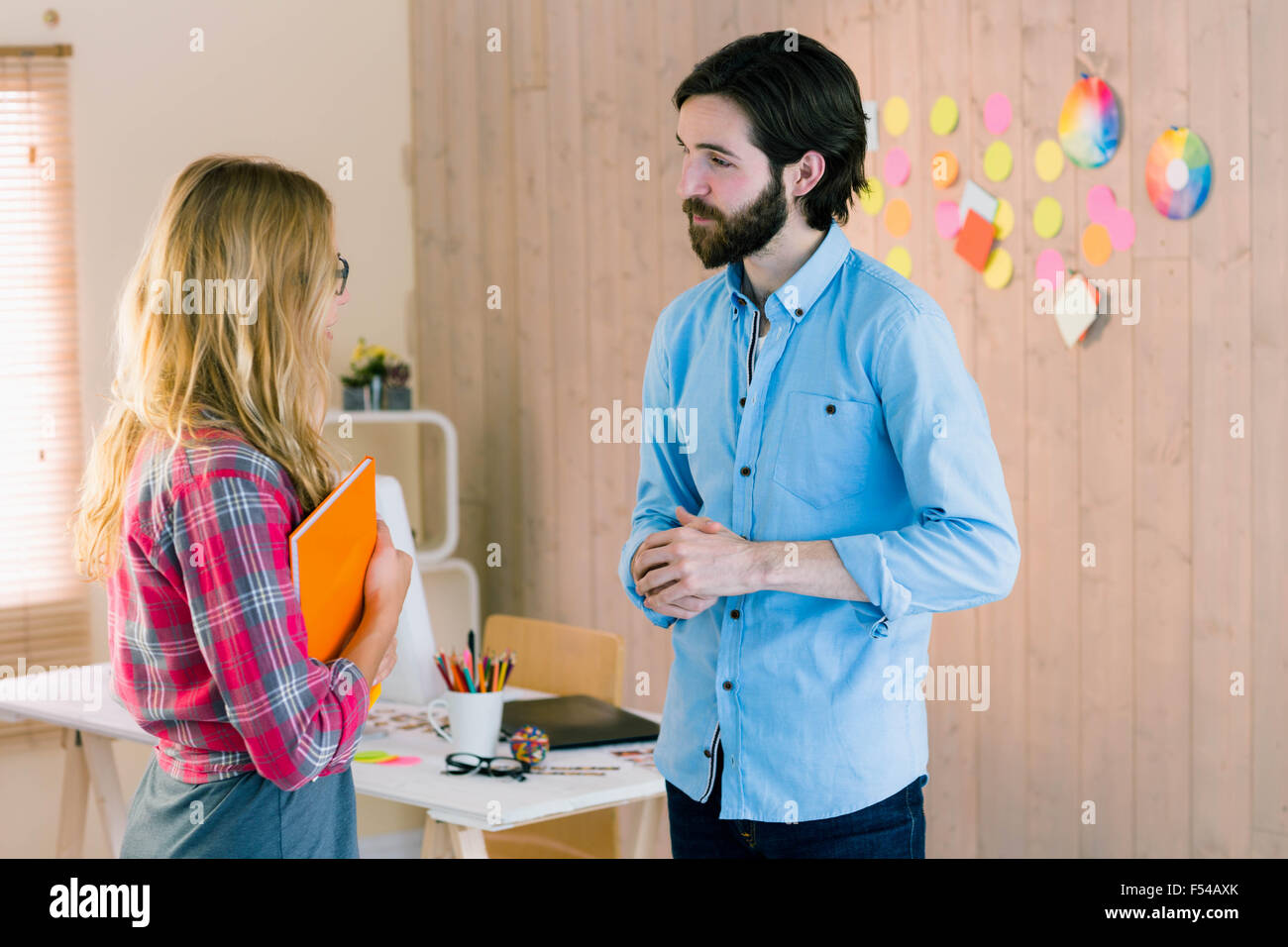 Creative team talking about their ideas Stock Photo - Alamy