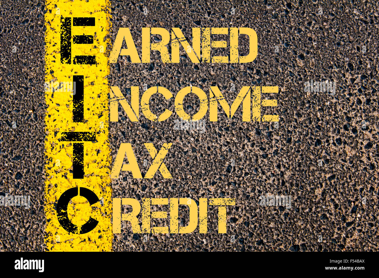 Concept image of Business Acronym EITC as EARNED INCOME TAX CREDIT ...