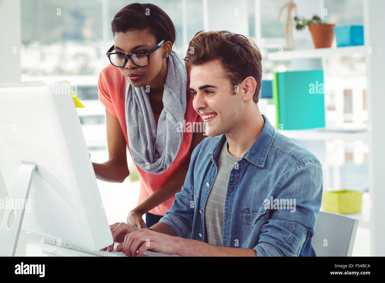 Creative business team working hard together Stock Photo - Alamy