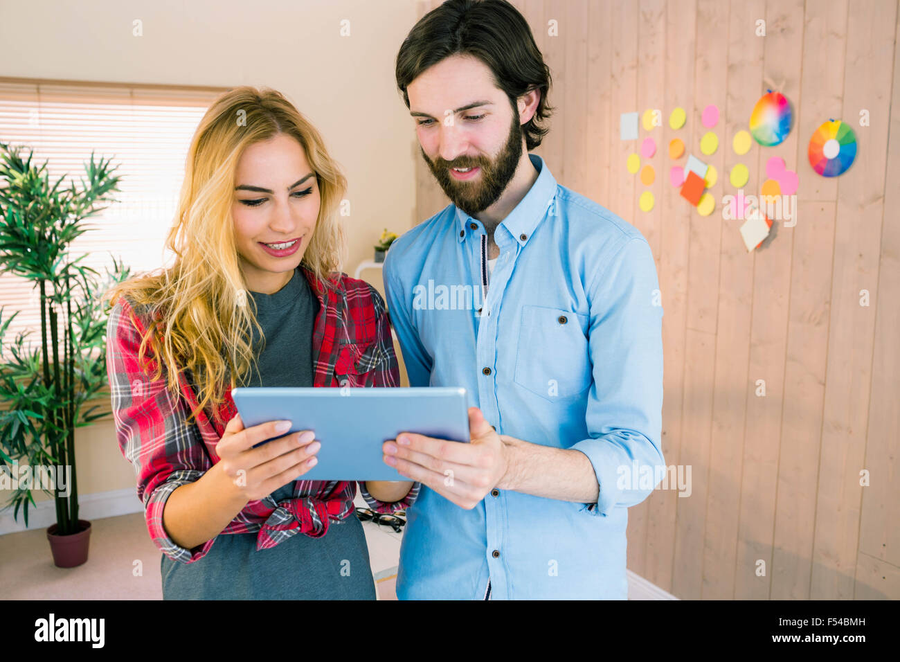 Creative team talking and smiling Stock Photo - Alamy