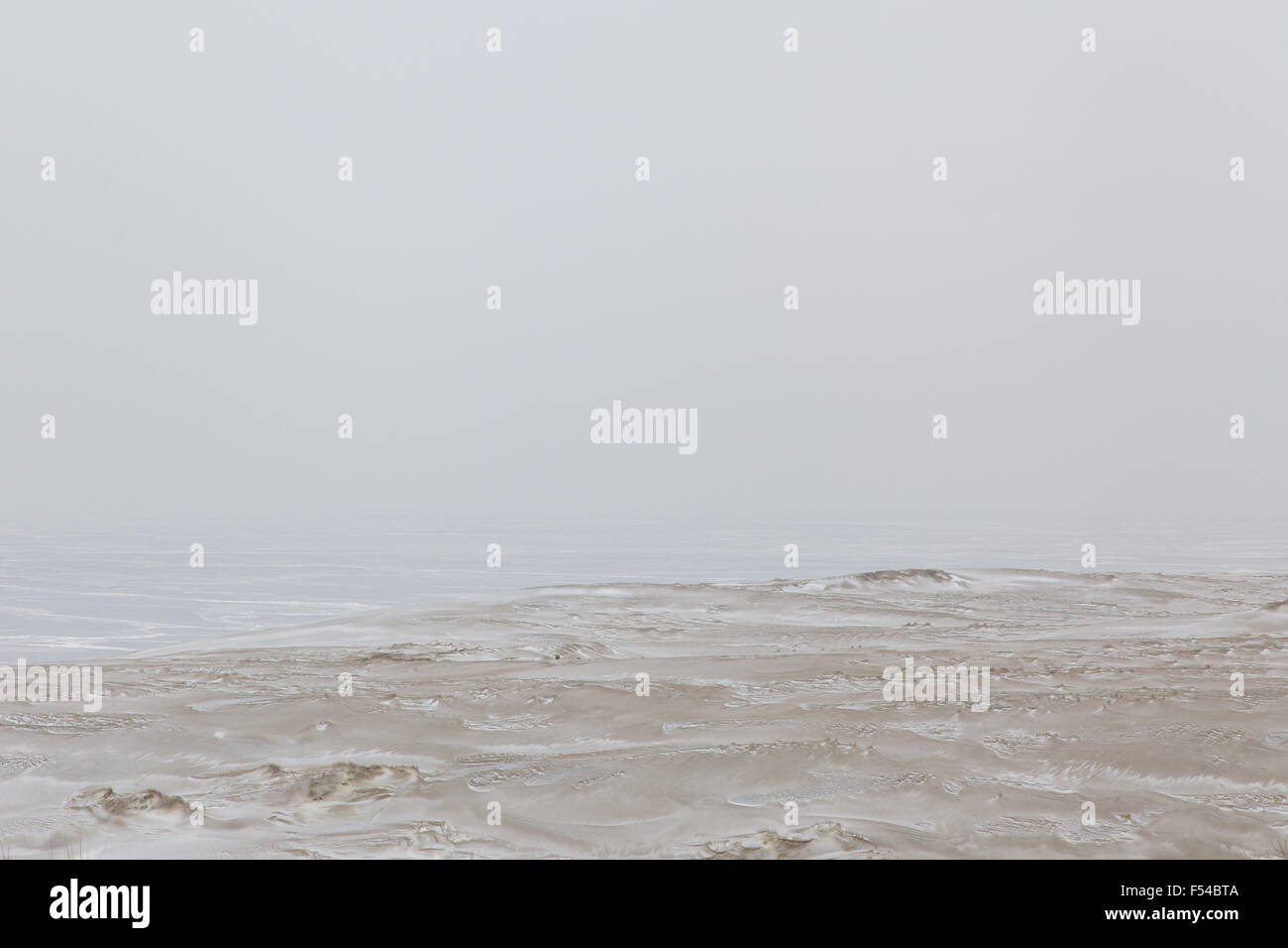 Snow covered sand dunes Stock Photo - Alamy