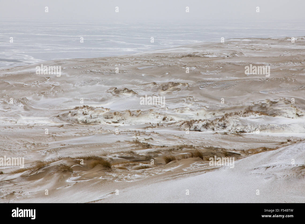 Snow covered sand dunes Stock Photo - Alamy