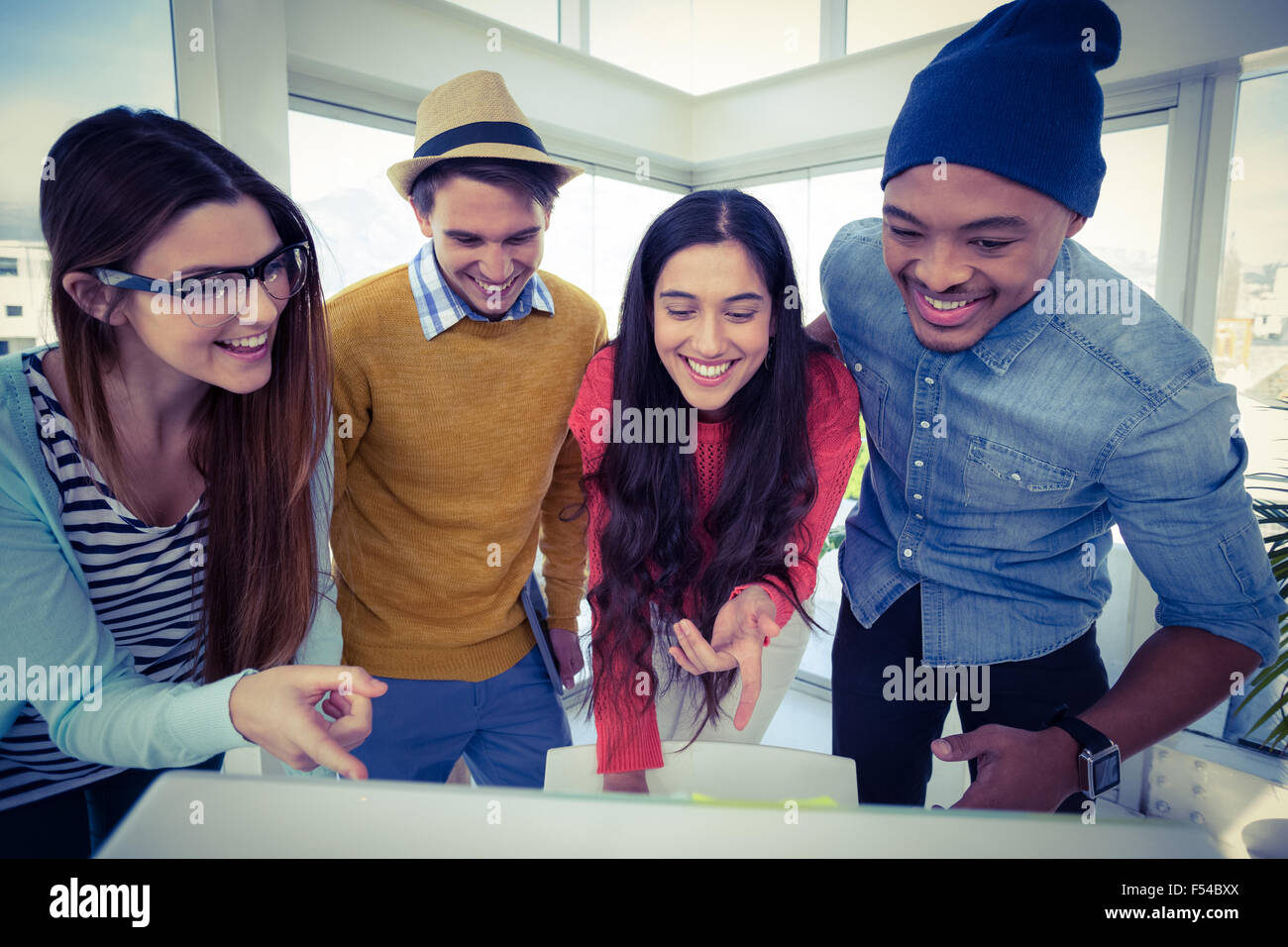 Young creative team having a meeting Stock Photo - Alamy