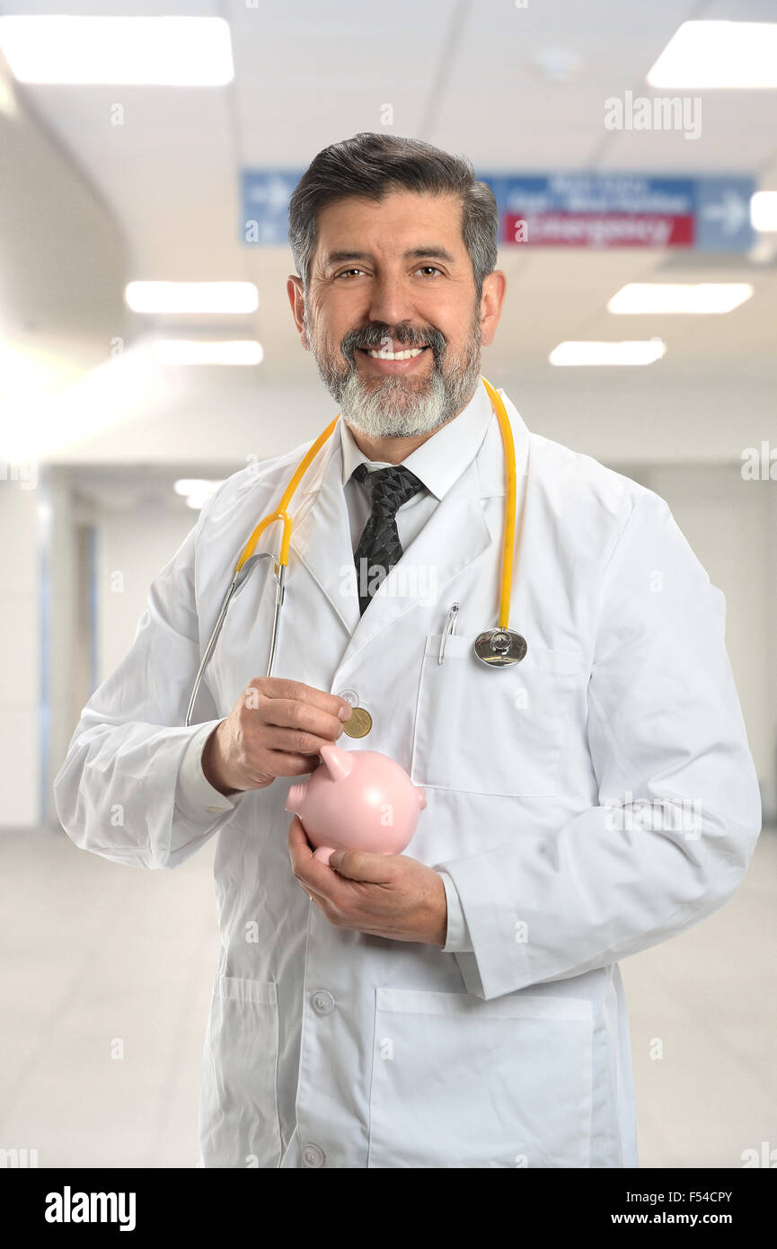 Portrait of Hispanic doctor putting money into piggy bank inside ...