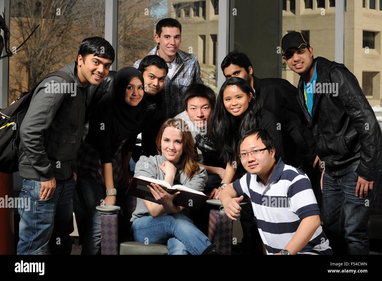 Group of diverse students inside college campus Stock Photo - Alamy