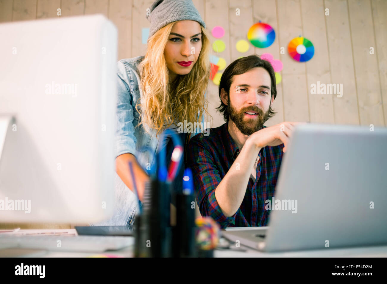 Creative team working at desk Stock Photo - Alamy