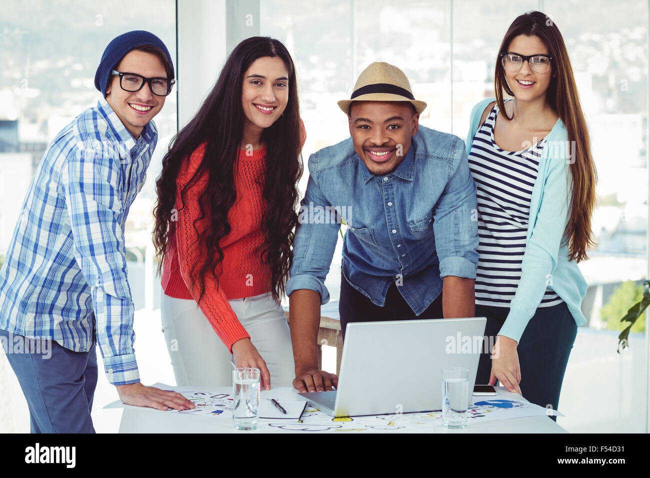 Young creative team having a meeting Stock Photo - Alamy
