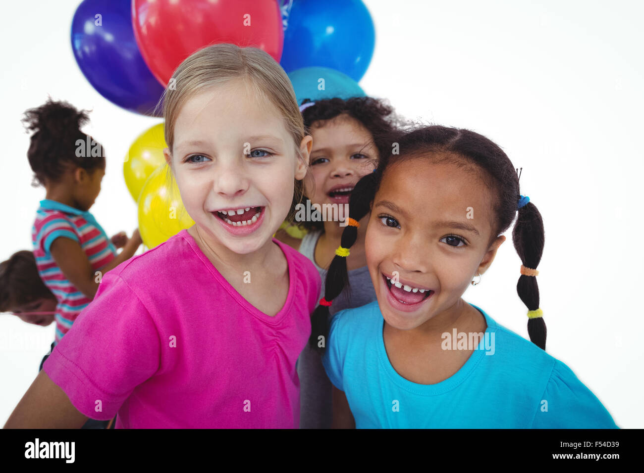 Group of kids together with balloons Stock Photo - Alamy