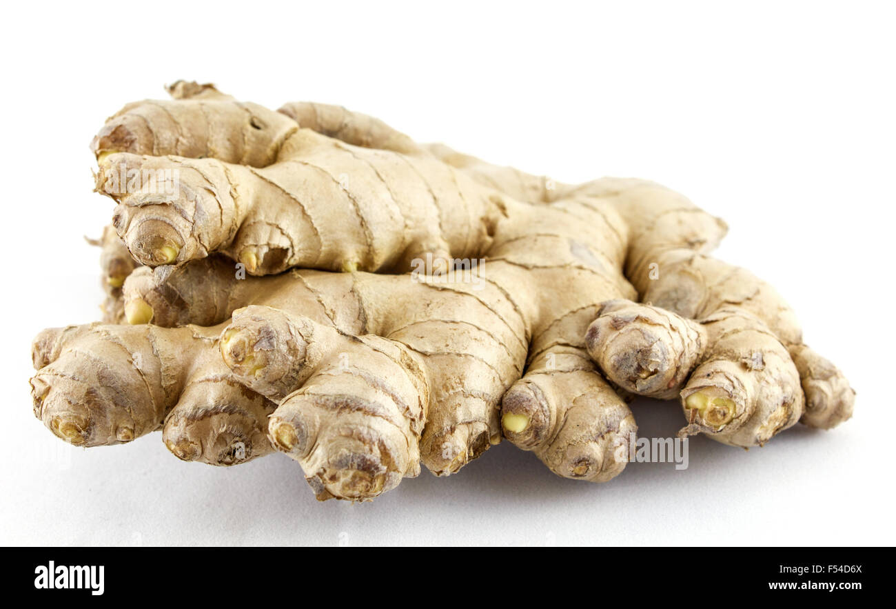 Ginger tuber on a white background Stock Photo - Alamy