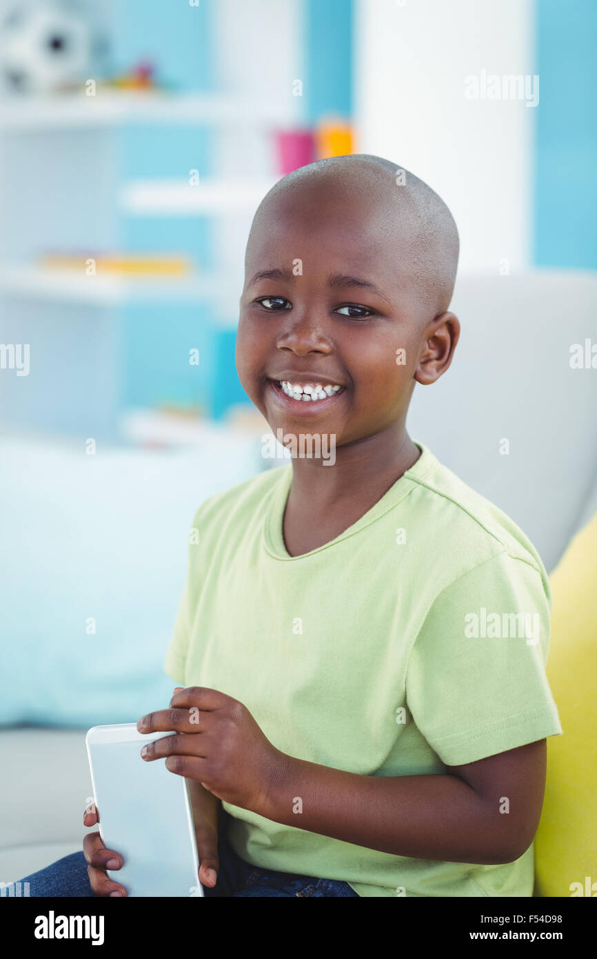 Happy boy using a smartphone Stock Photo - Alamy