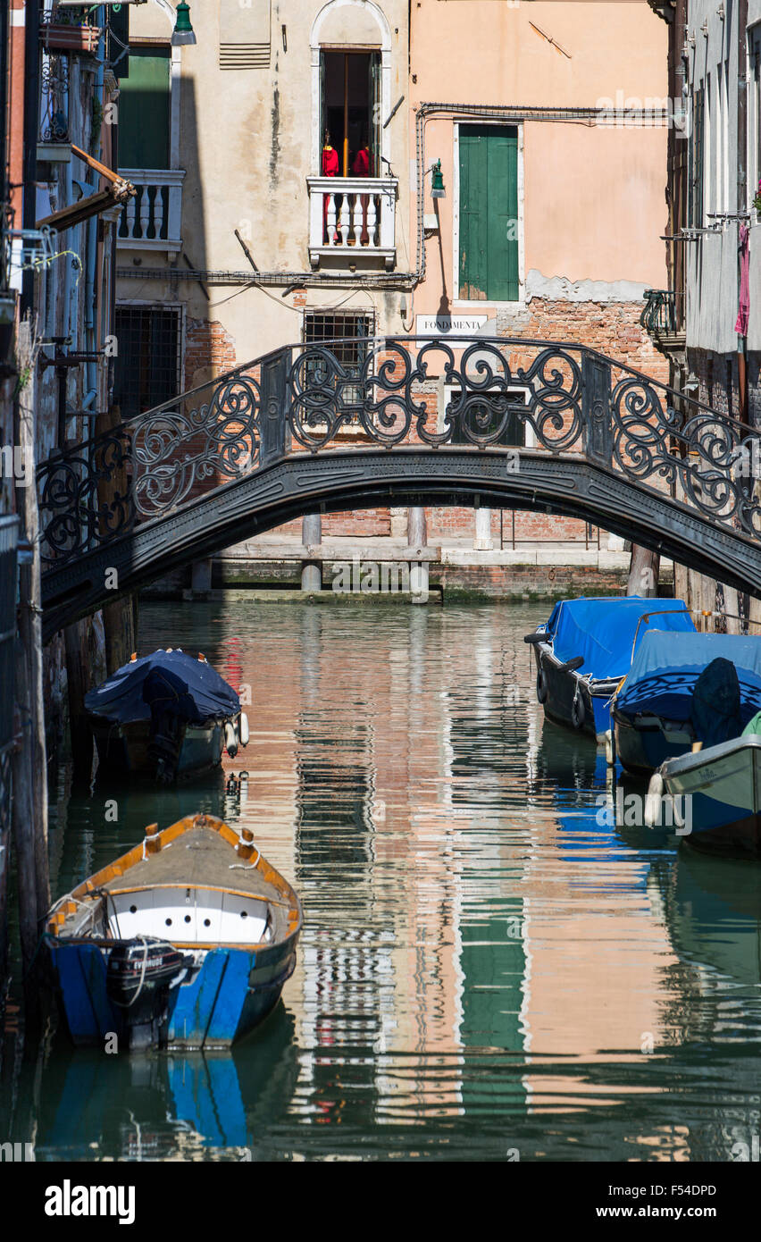 Canal scene with reflections, Venice, Italy Stock Photo - Alamy