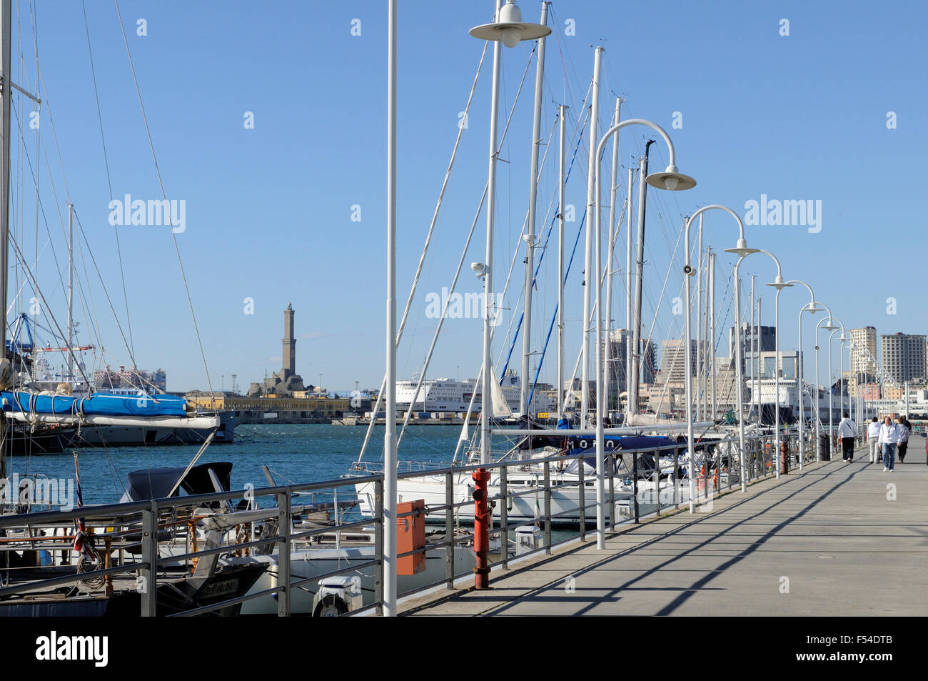 Skyline of Genoa from the harbor. The lighthouse on the left, called ...