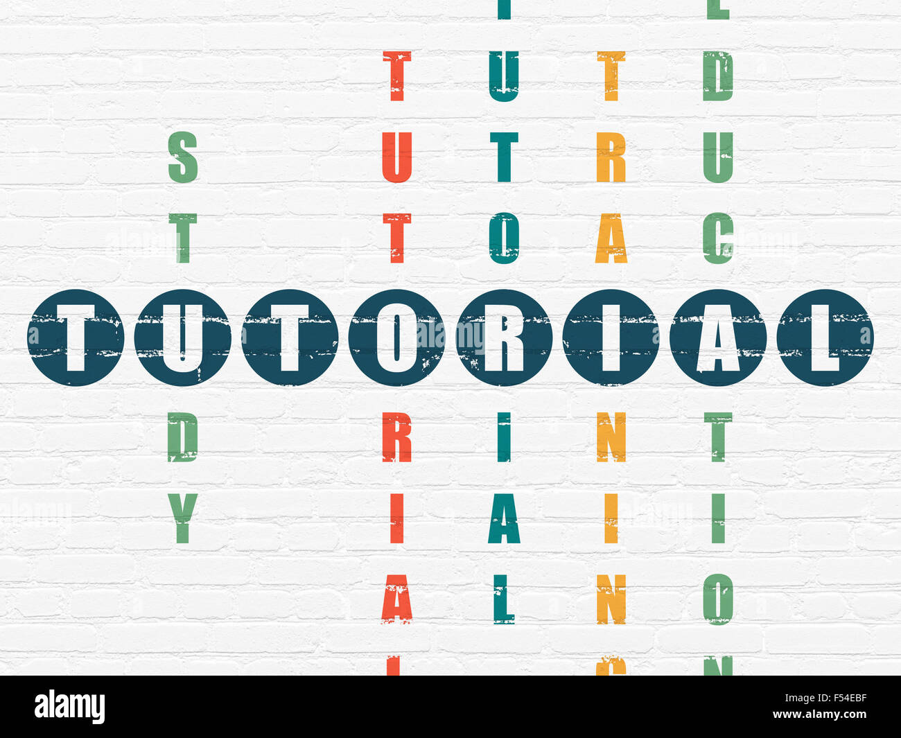 Learning concept: Tutorial in Crossword Puzzle Stock Photo - Alamy