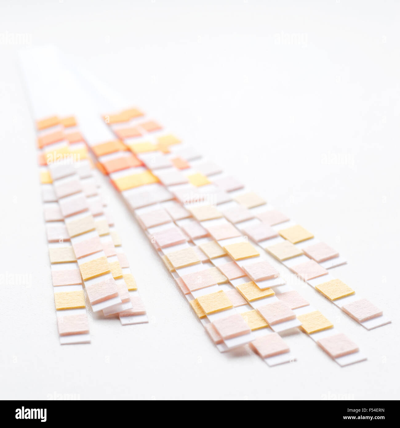 Many test strips for semiquantitative analysis on white background ...
