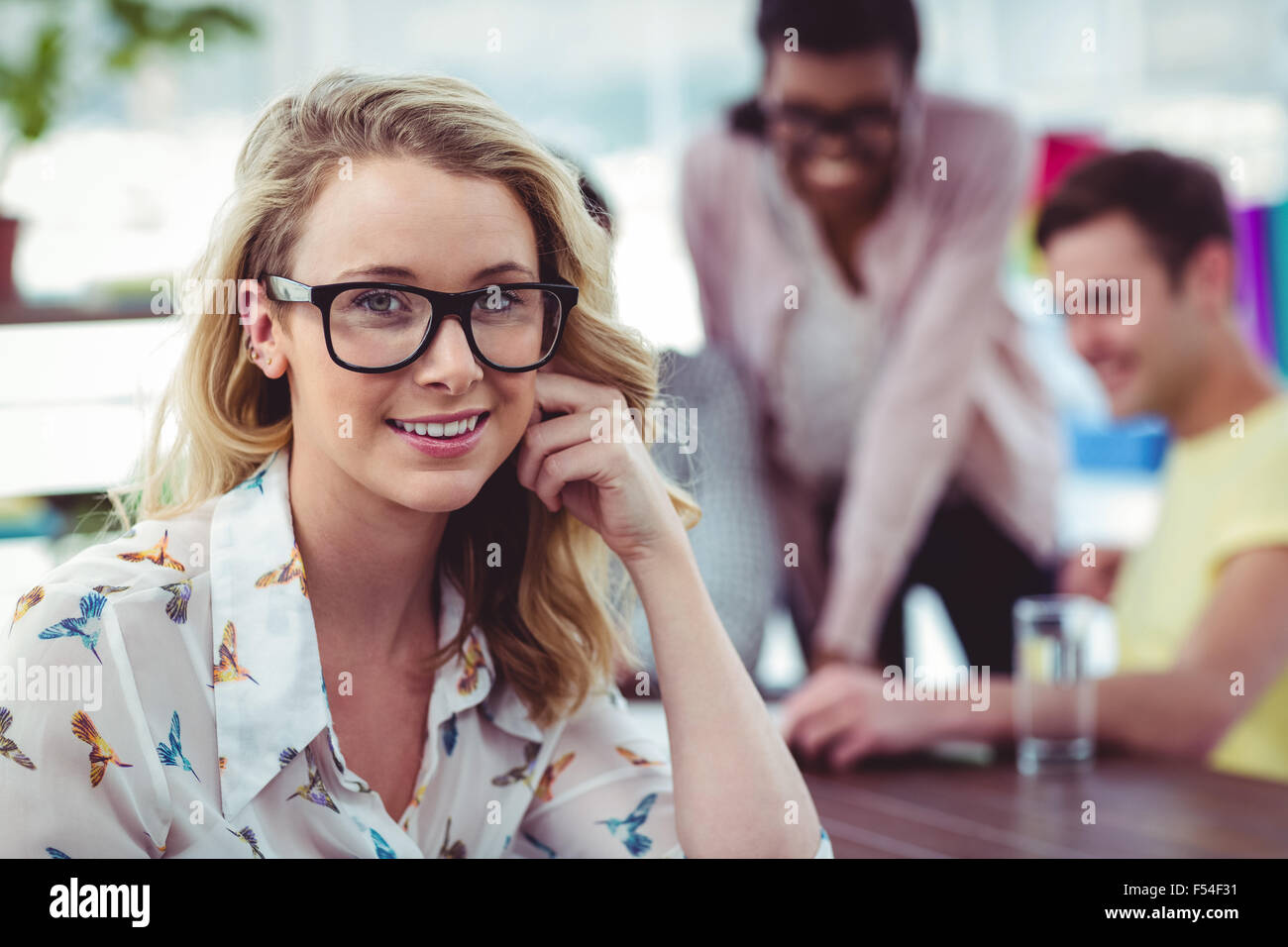 Creative business team working hard together Stock Photo - Alamy