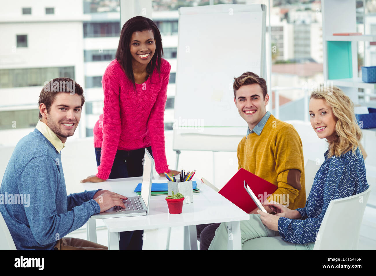 Creative business team working hard together Stock Photo - Alamy