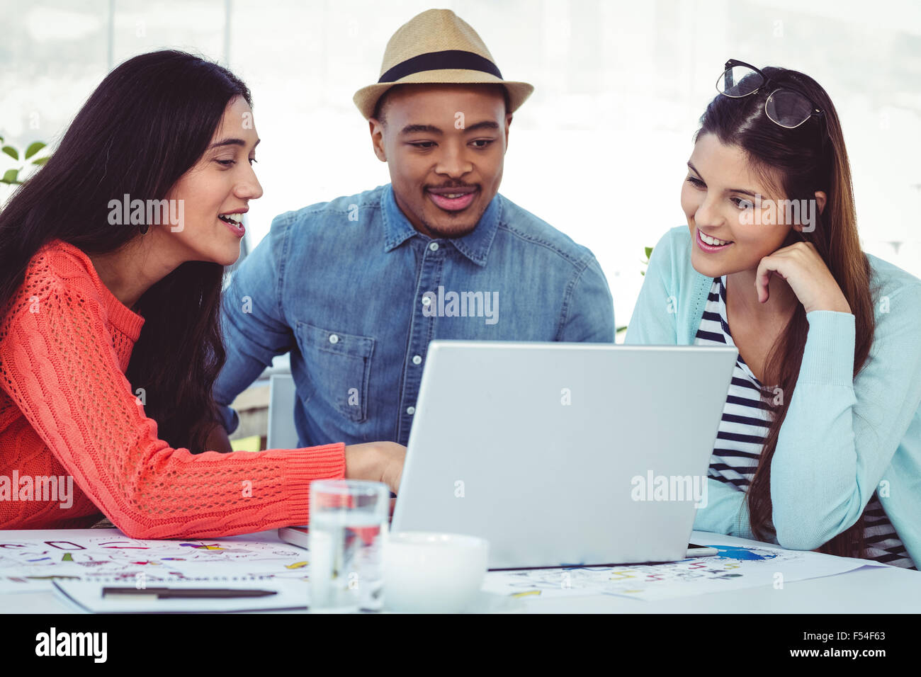 Young creative team having a meeting Stock Photo - Alamy