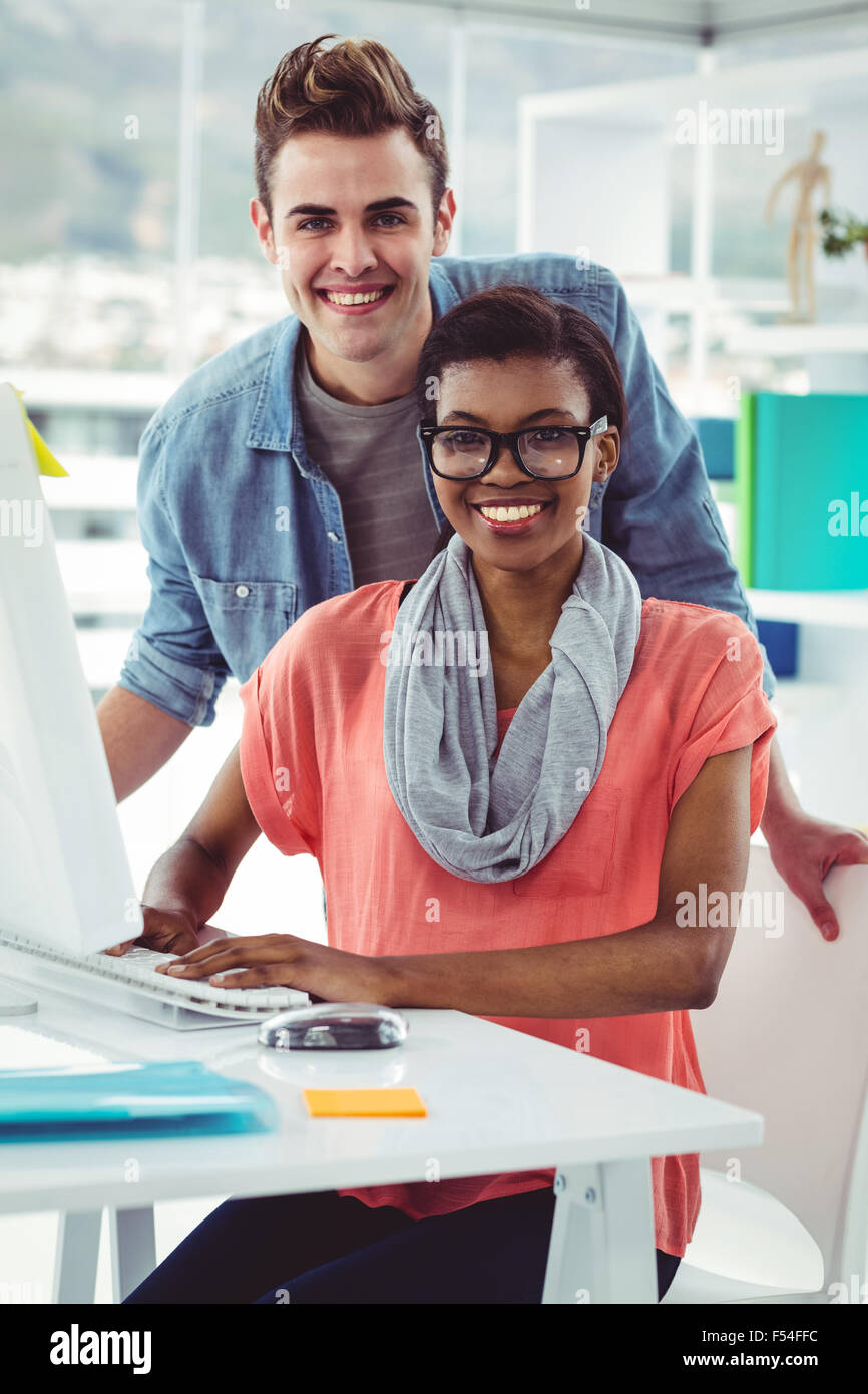 Creative business team working hard together Stock Photo - Alamy