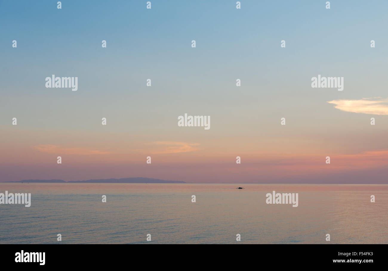 Beautiful pink sunset over ocean hi-res stock photography and images ...