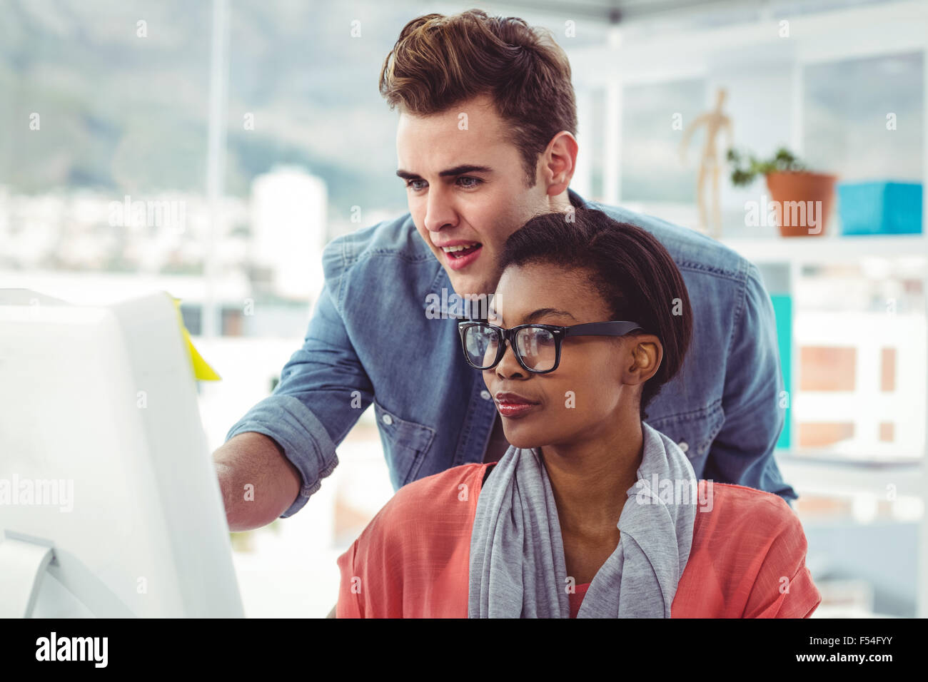 Creative business team working hard together Stock Photo - Alamy