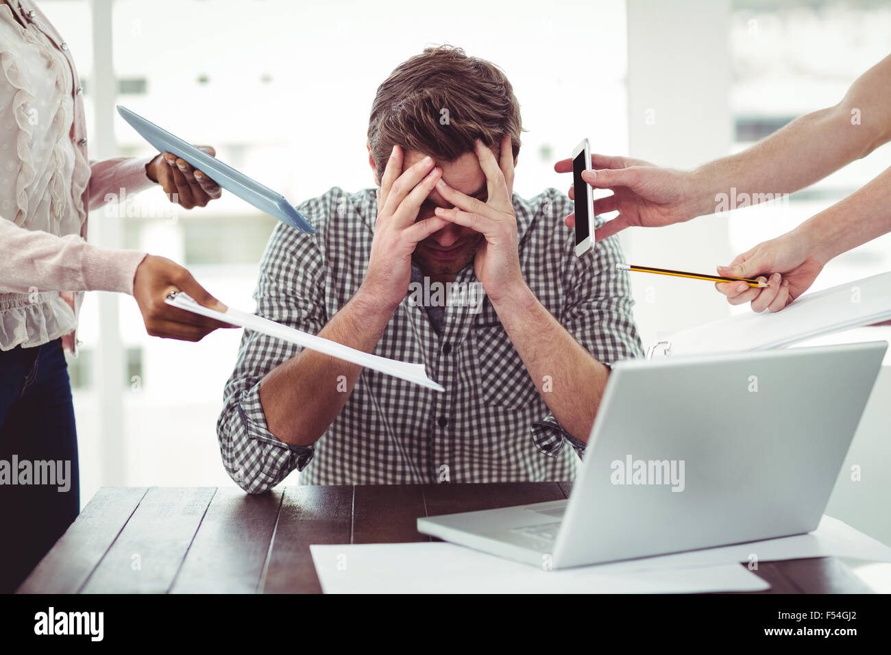 Businessman stressed out at work Stock Photo - Alamy