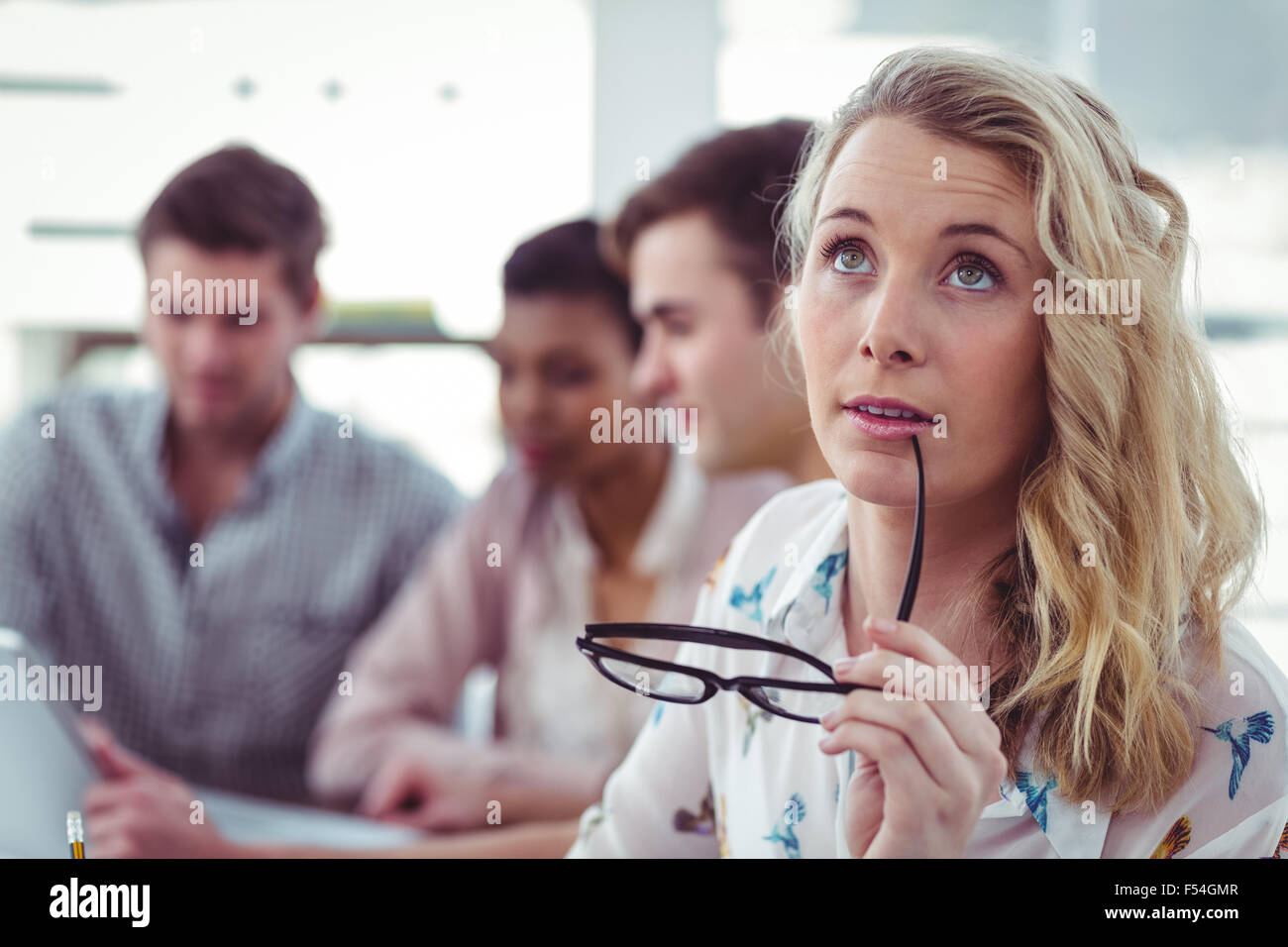 Creative business team working hard together Stock Photo - Alamy
