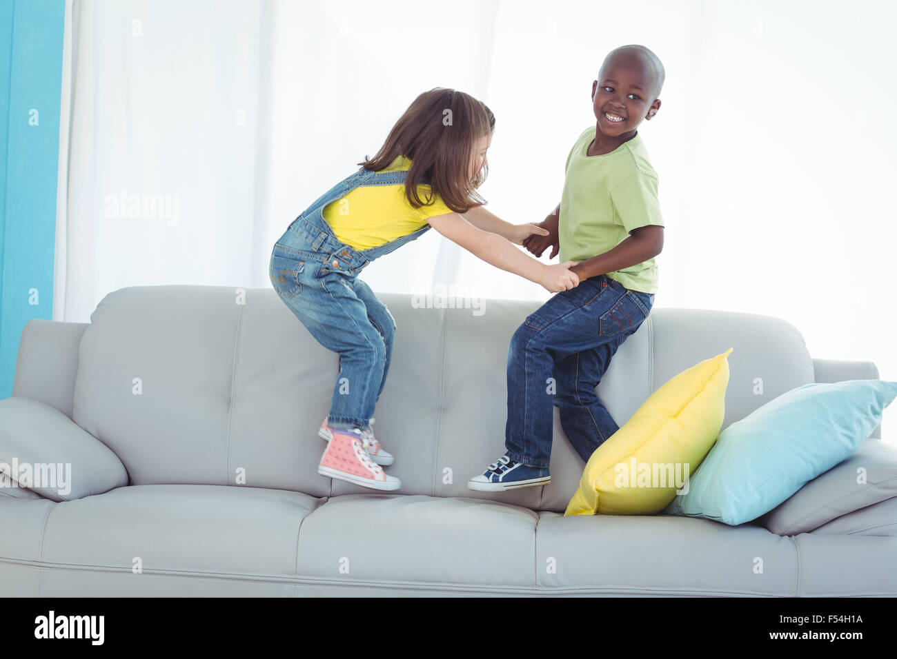 Boy and girl standing together hi-res stock photography and images - Alamy