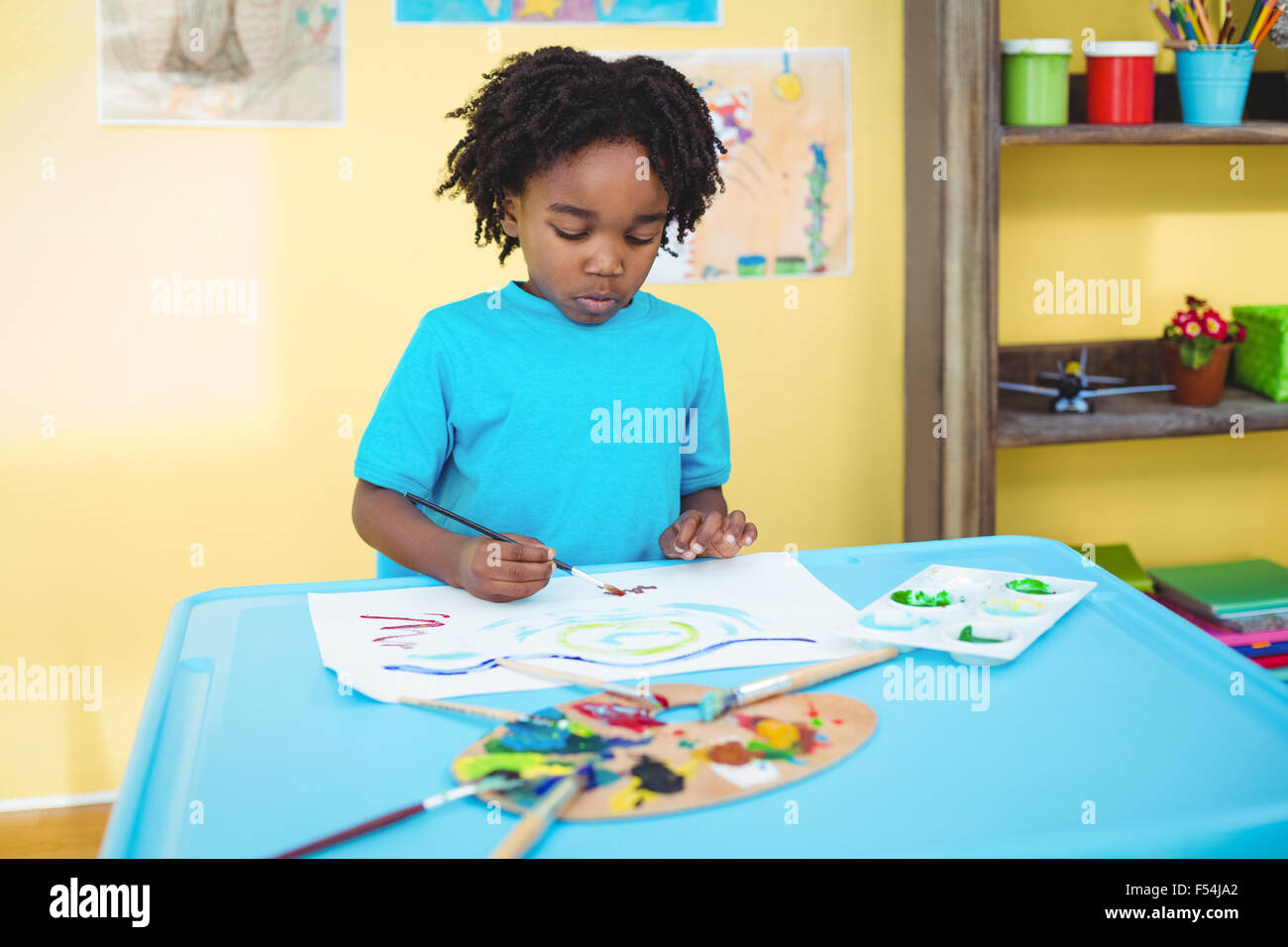 Happy kid painting hi-res stock photography and images - Alamy