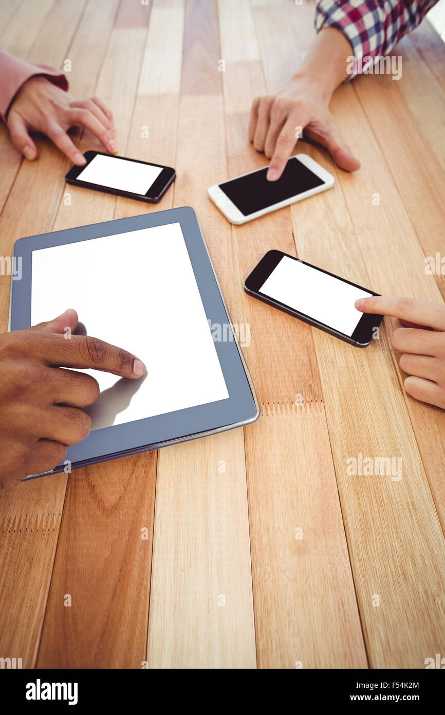 Team meeting using tablet and phone hi-res stock photography and images ...