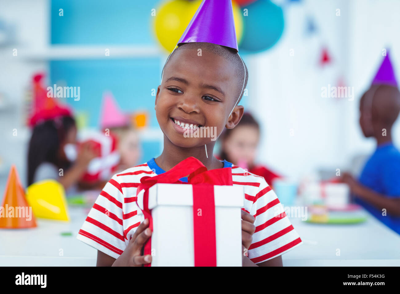 Happy kids at a birthday party Stock Photo - Alamy