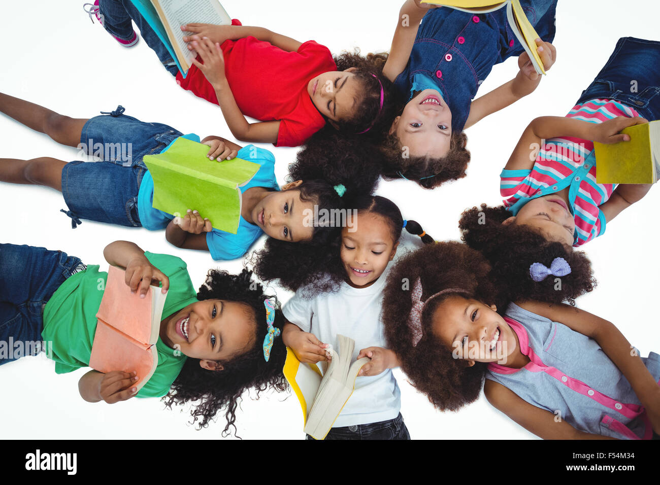 Group of girls reading books Stock Photo - Alamy