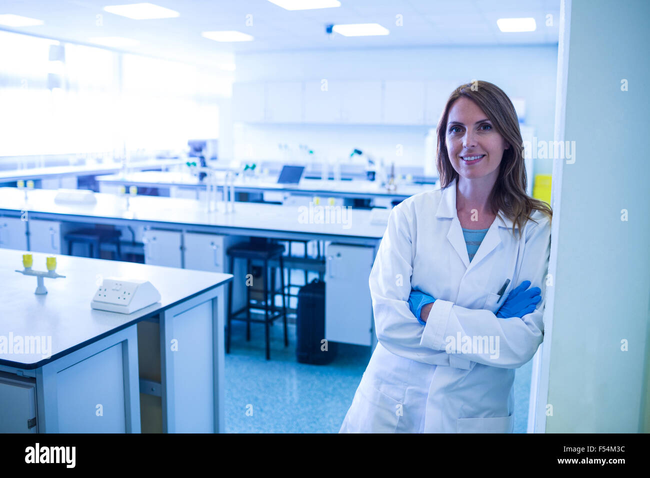 Scientist looking at camera in the laboratory Stock Photo - Alamy