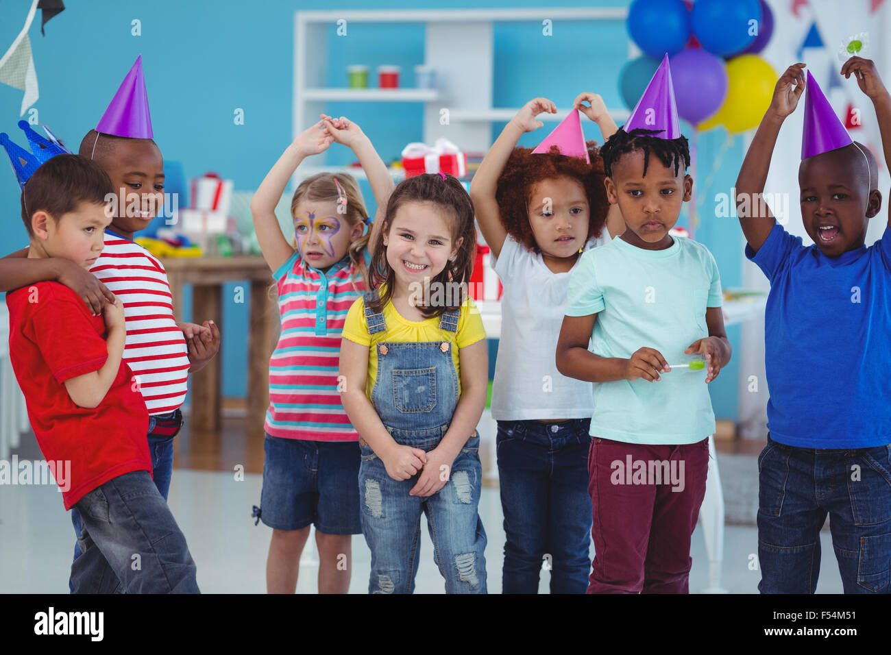 Happy kids enjoying a birthday party Stock Photo - Alamy