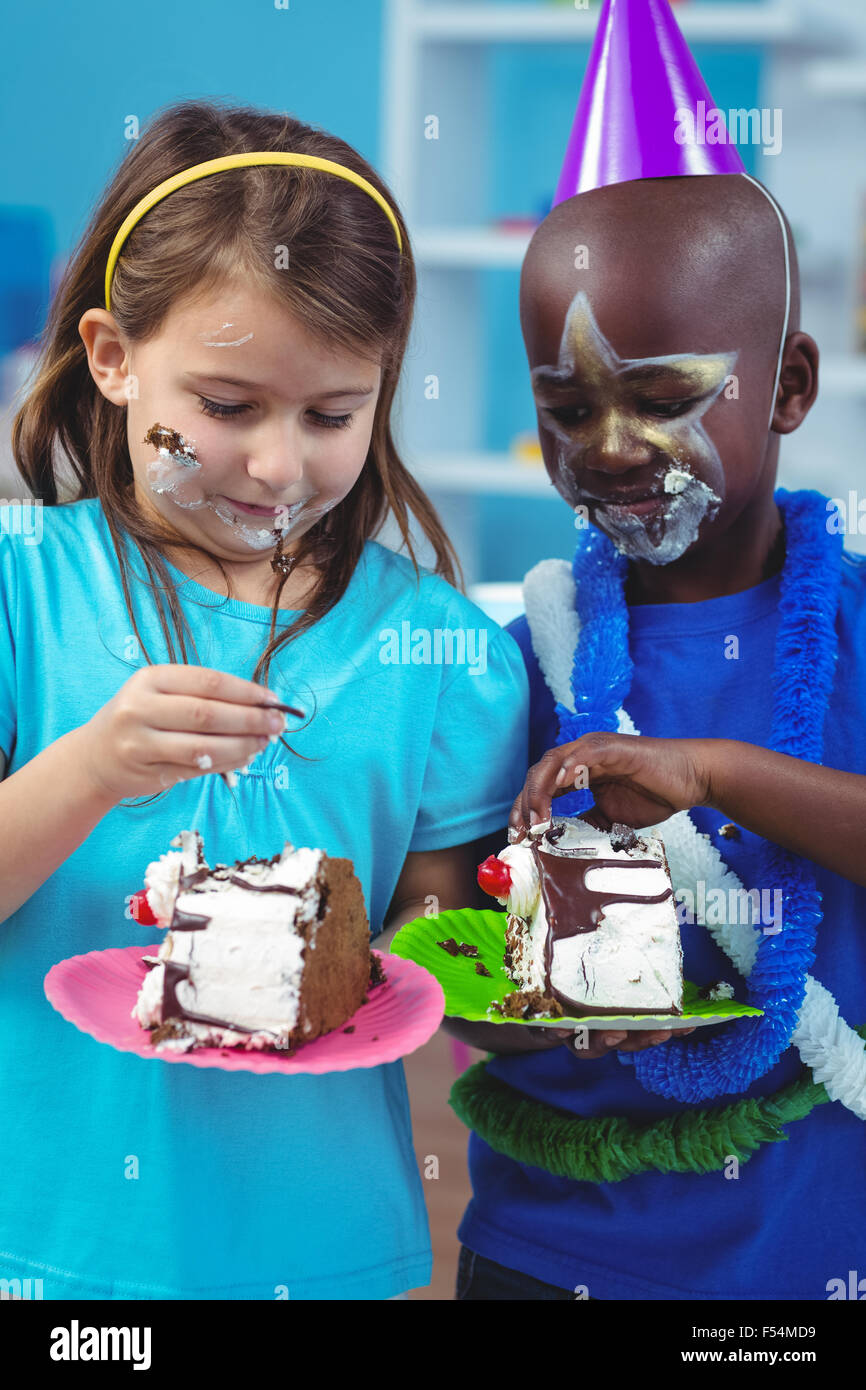 Child eating messy cake hi-res stock photography and images - Alamy