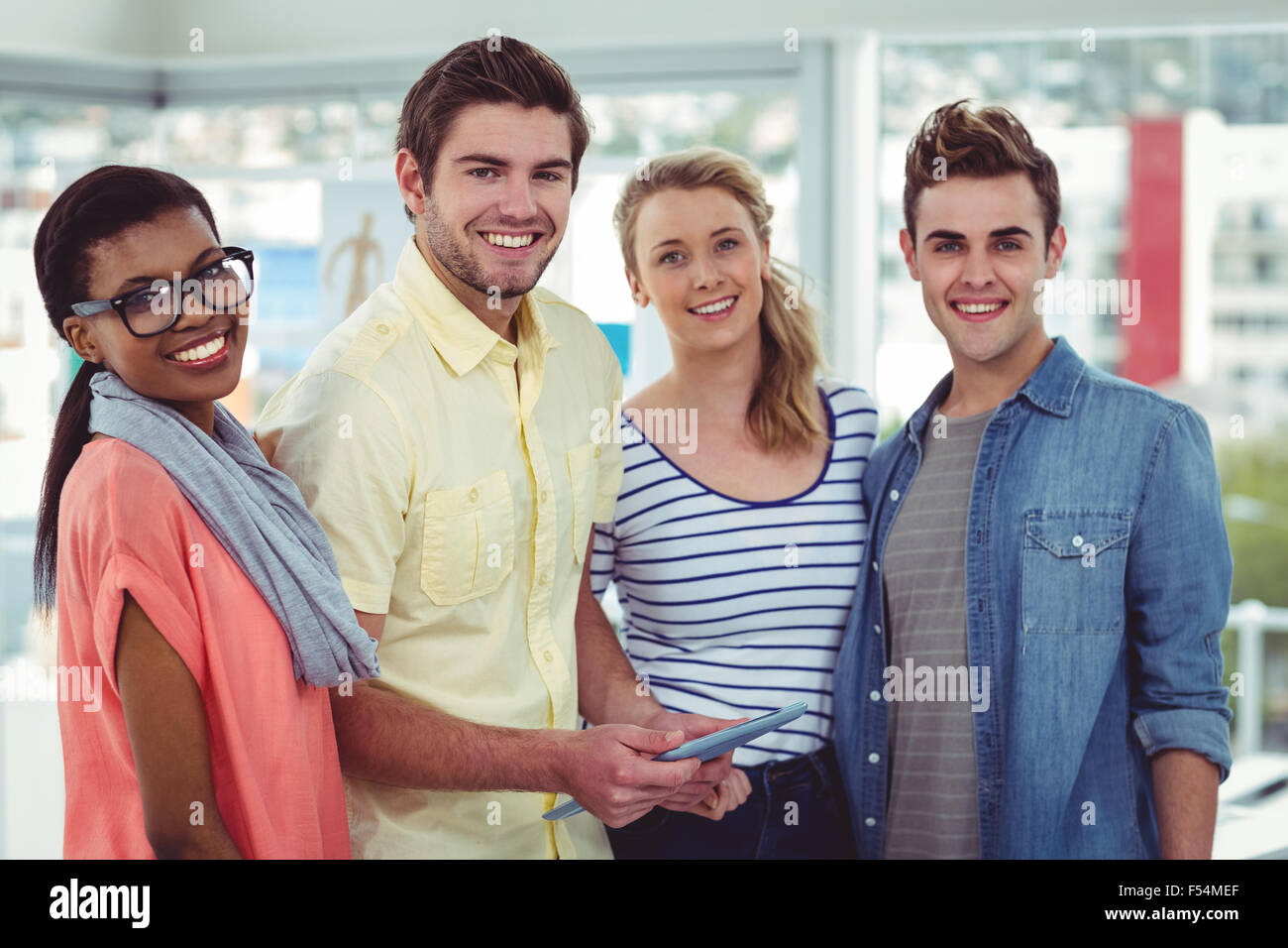 Creative team using tablet hi-res stock photography and images - Alamy