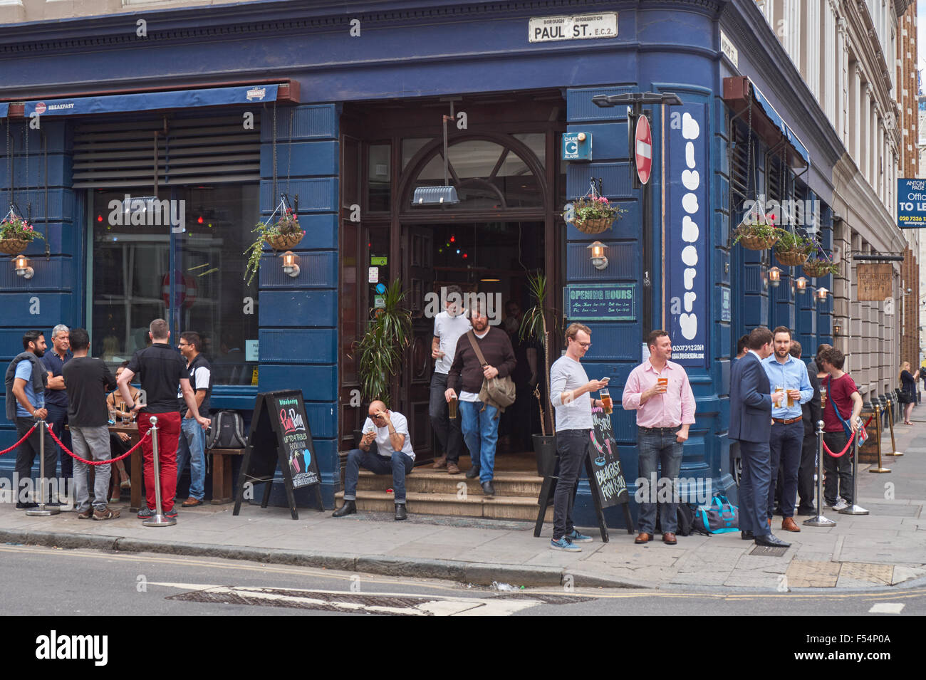 People drinking outside pub in London England United Kingdom UK Stock ...