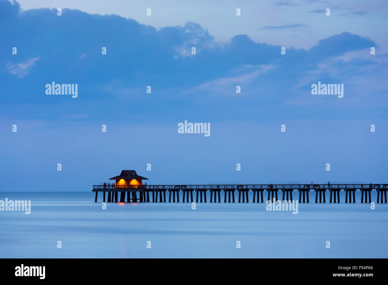 The pier at Naples beach at sunset in Florida, United States of America ...