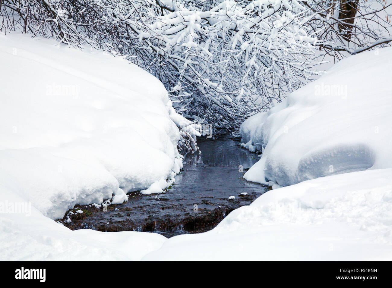 Winter River with Snow and Rocks Stock Photo - Alamy