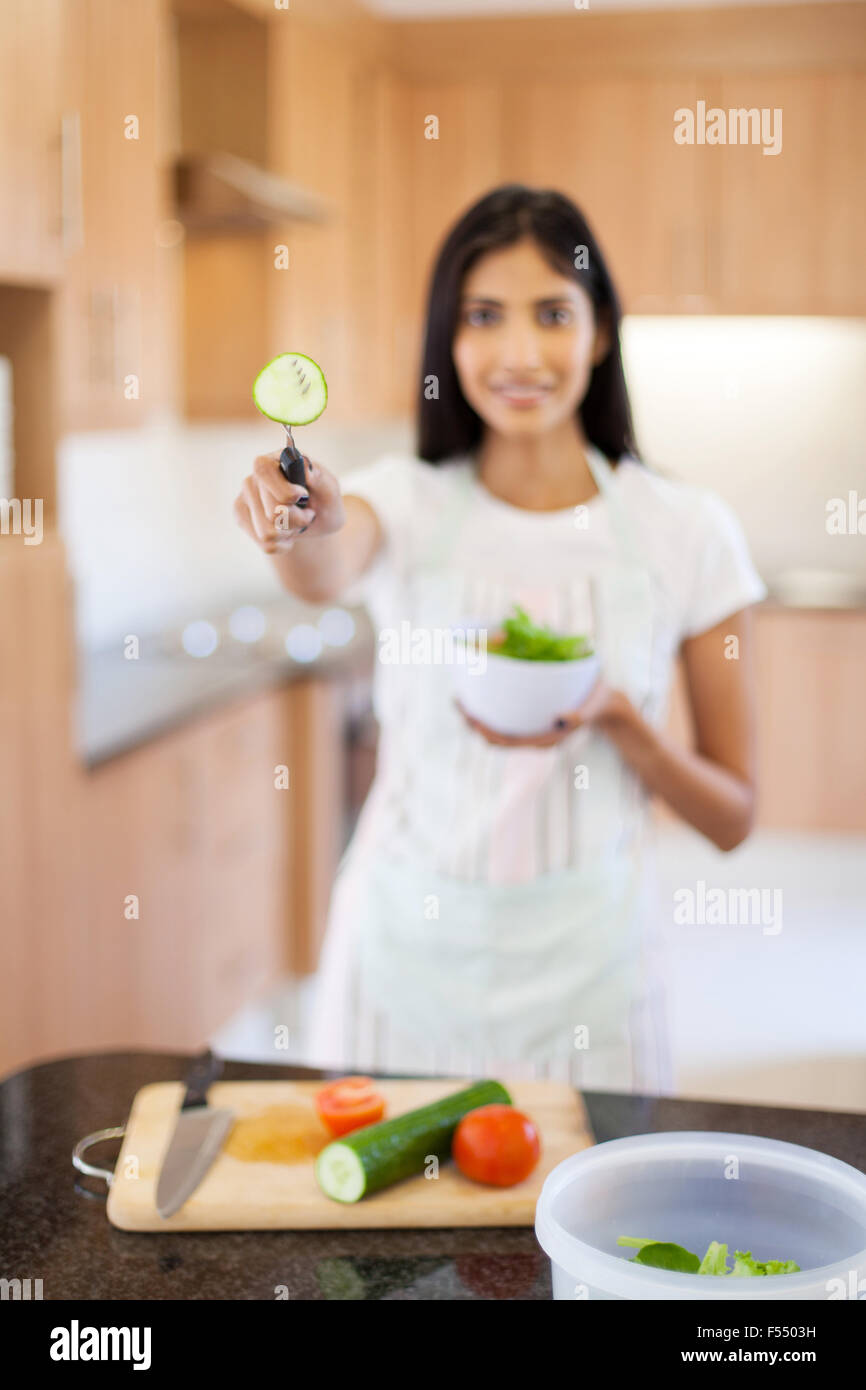 Indian woman holding kitchen utensils hi-res stock photography and ...