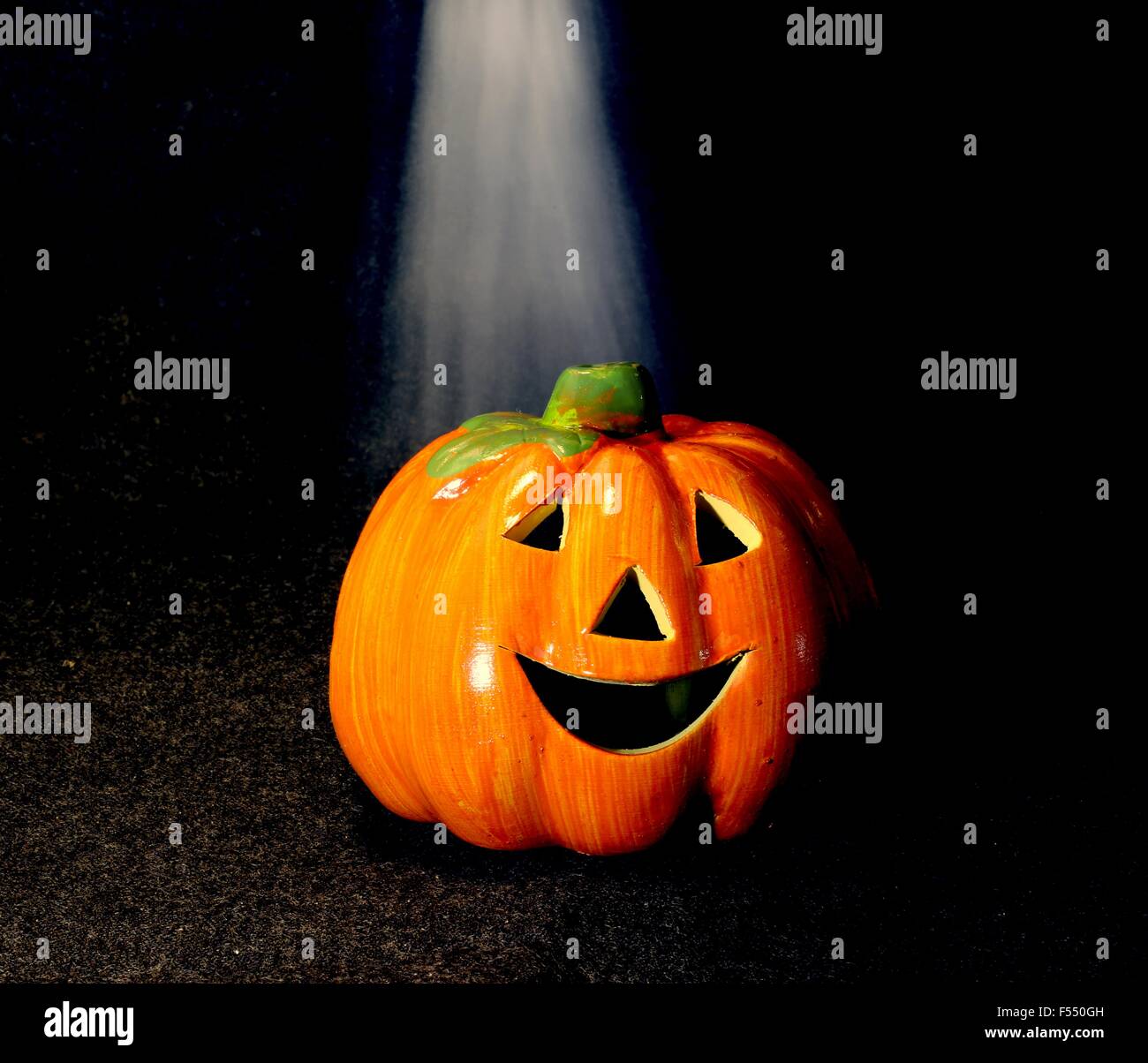 Orange jack o lantern symbols of Halloween with white smoke Stock Photo ...
