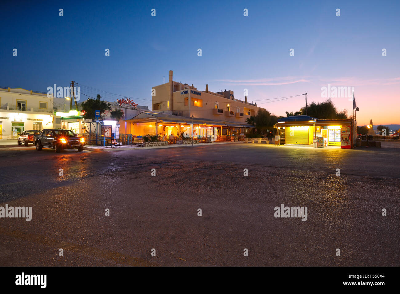 Coffee shops in the main street of Adamantas village by the harbour ...