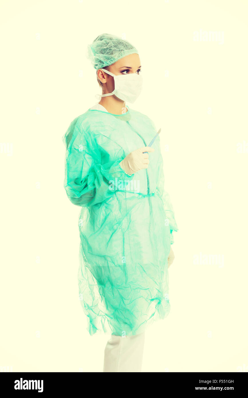 Female doctor with a scalpel Stock Photo - Alamy