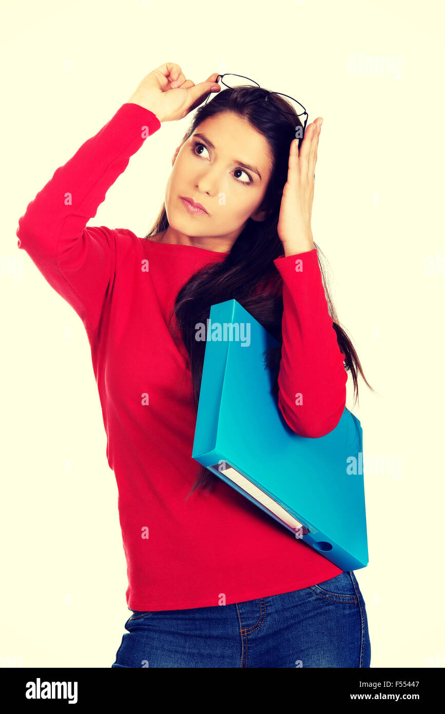 Woman holding blue folder Stock Photo - Alamy