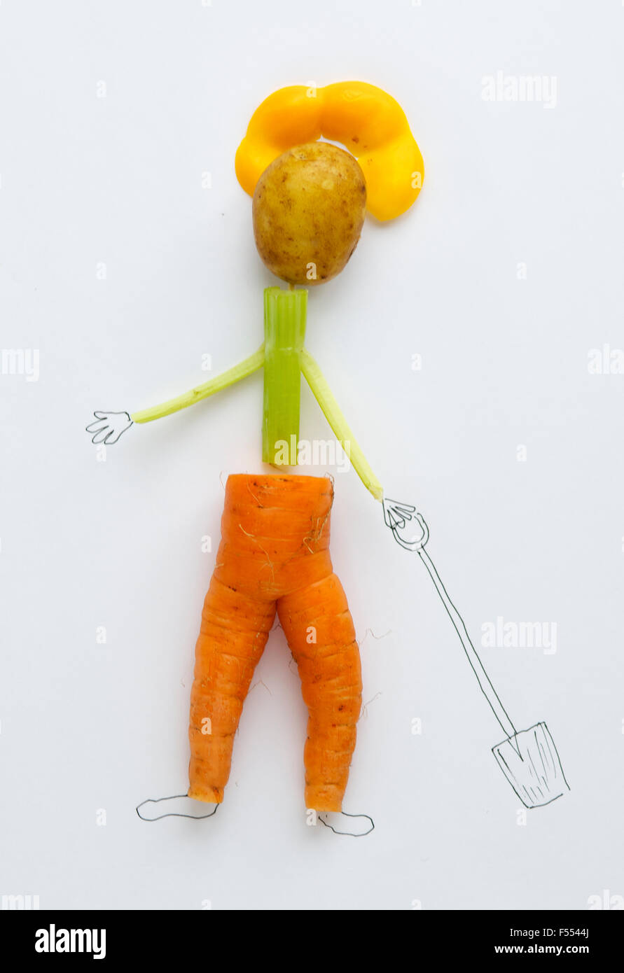 Figure made from vegetables with drawing background Stock Photo - Alamy