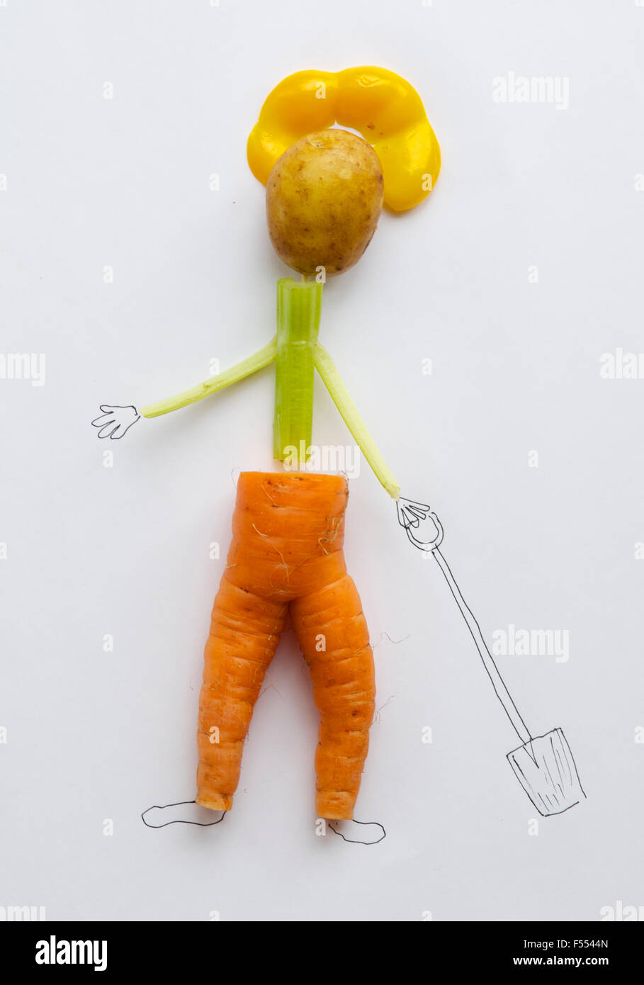 Figure made from vegetables with drawing background Stock Photo - Alamy